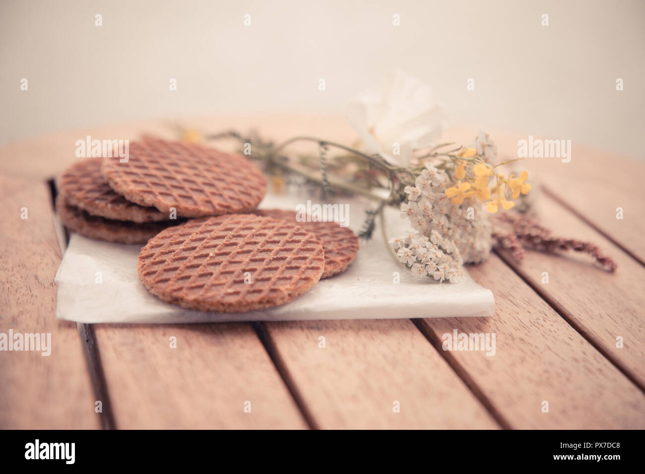 Traditional Dutch Stroopwafels syrup filled waffle cookies in setting ...