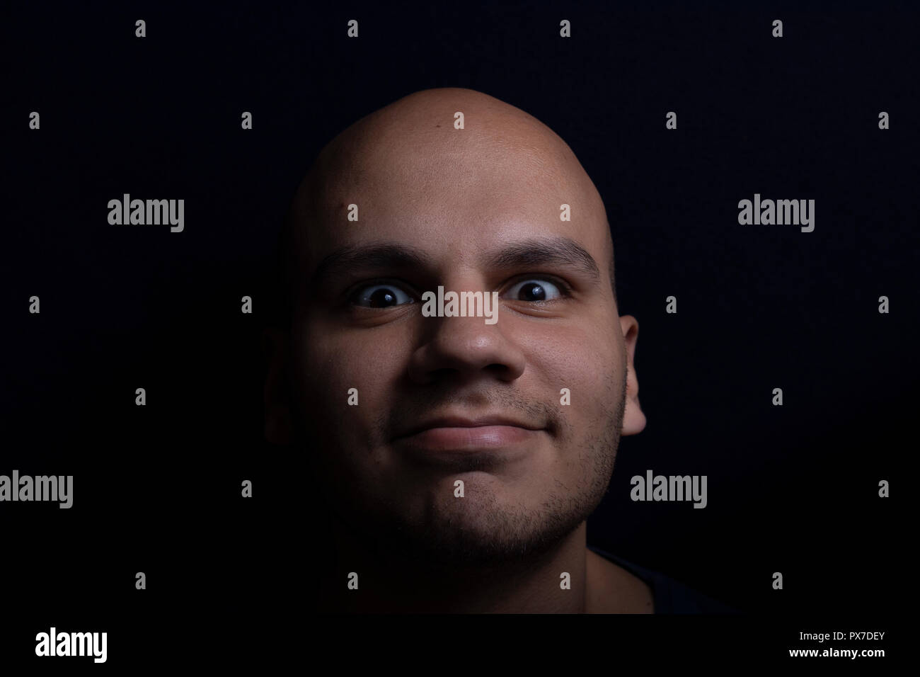 Portrait of Bald Man on Black Background Stock Photo - Alamy