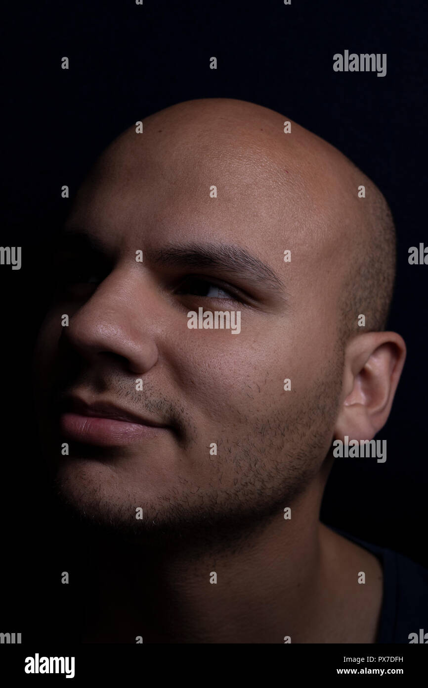 Portrait of Bald Man on Black Background Stock Photo - Alamy