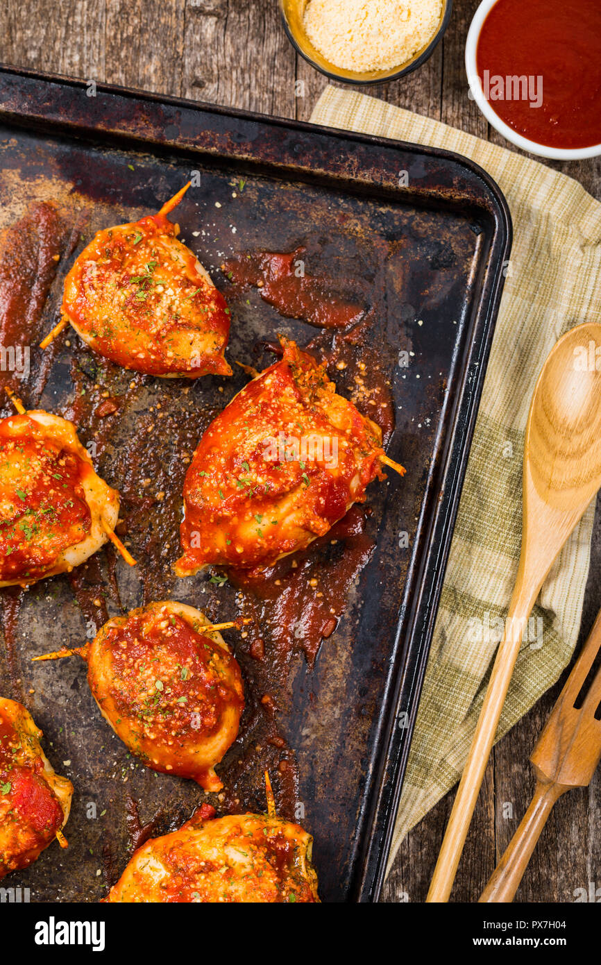 Stuffed Calamari Squid Tubes with Tomato Sauce Stock Photo - Alamy