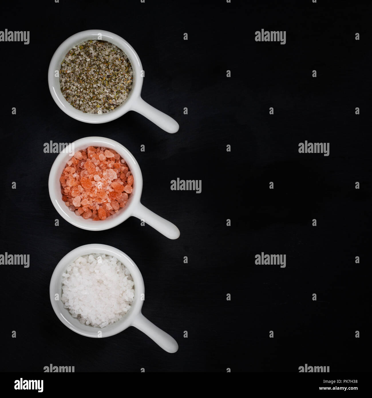 Types of Salt Himalayan, Kosher and Sea Salt Herb Seasoning on Black ...