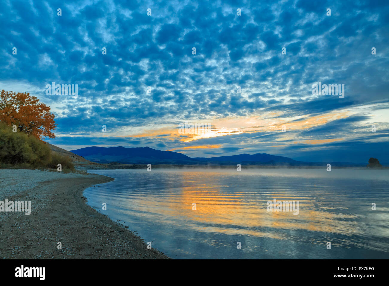 sunrise over canyon ferry lake near winston, montana Stock Photo - Alamy
