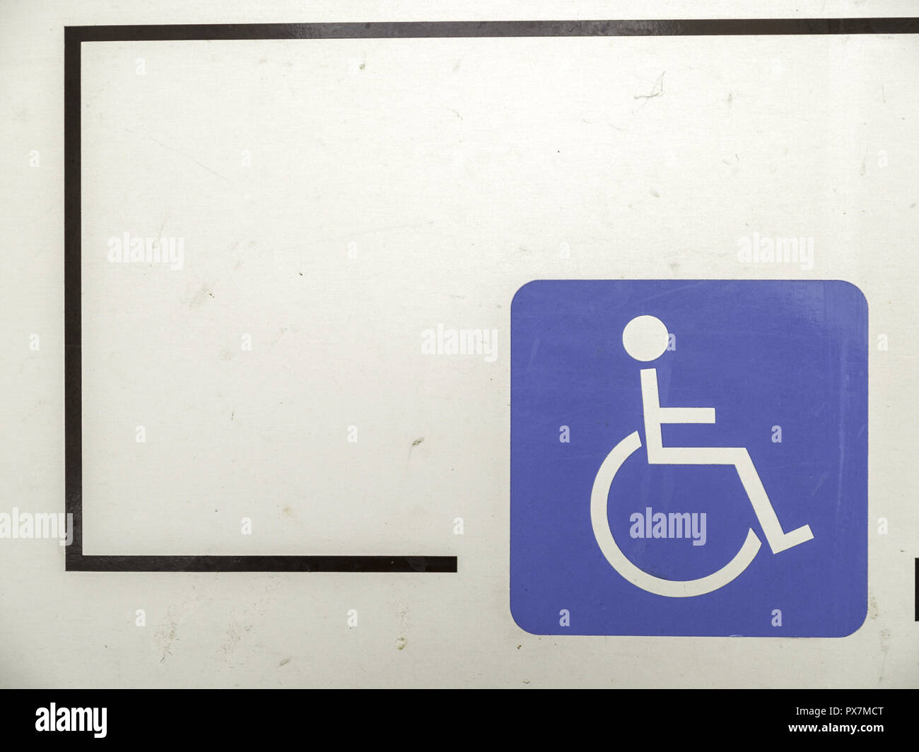 Direction sign for disabled people Stock Photo - Alamy