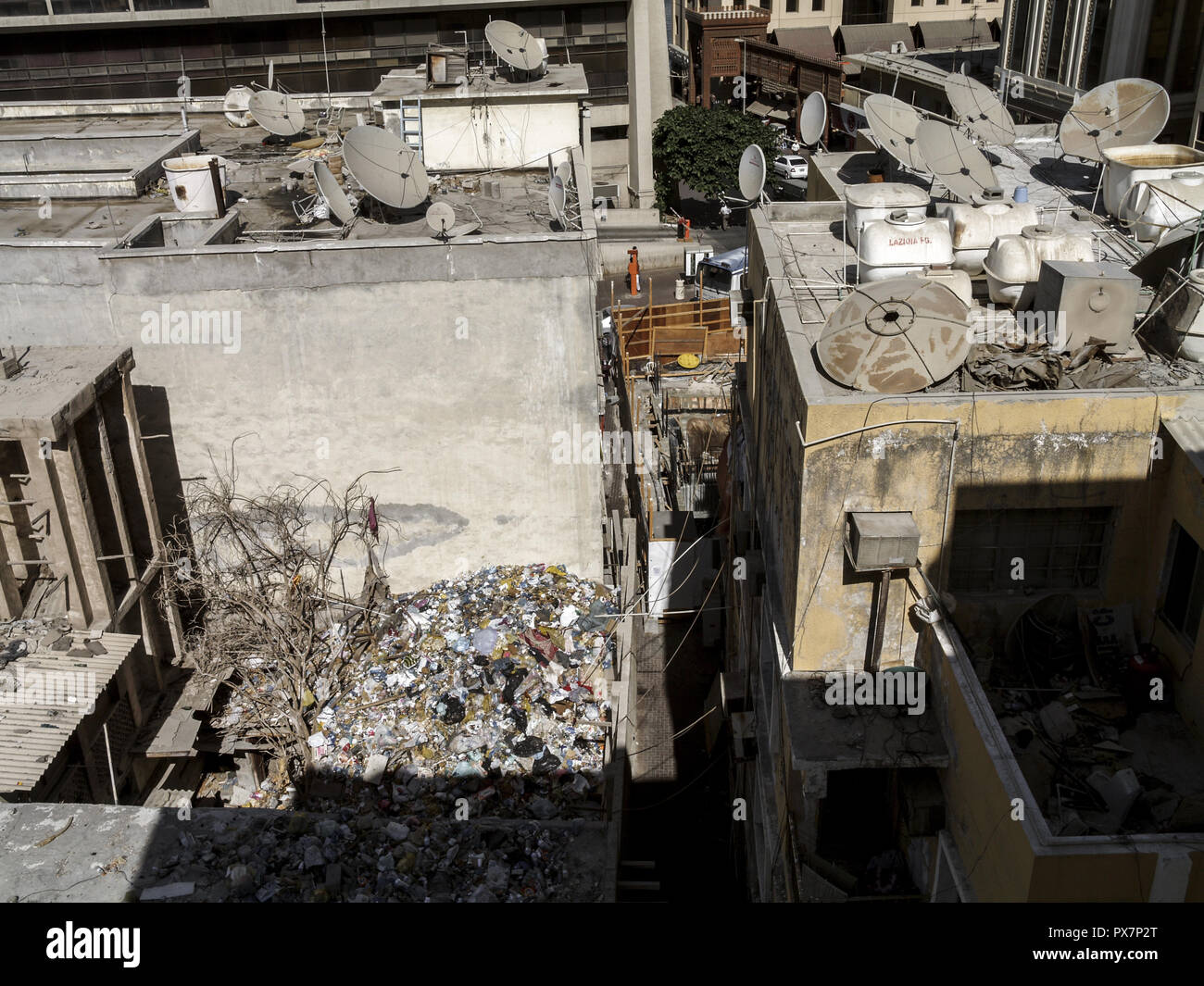 Dubai, dirty backyards with garbage and satellite dishes, United Arab ...