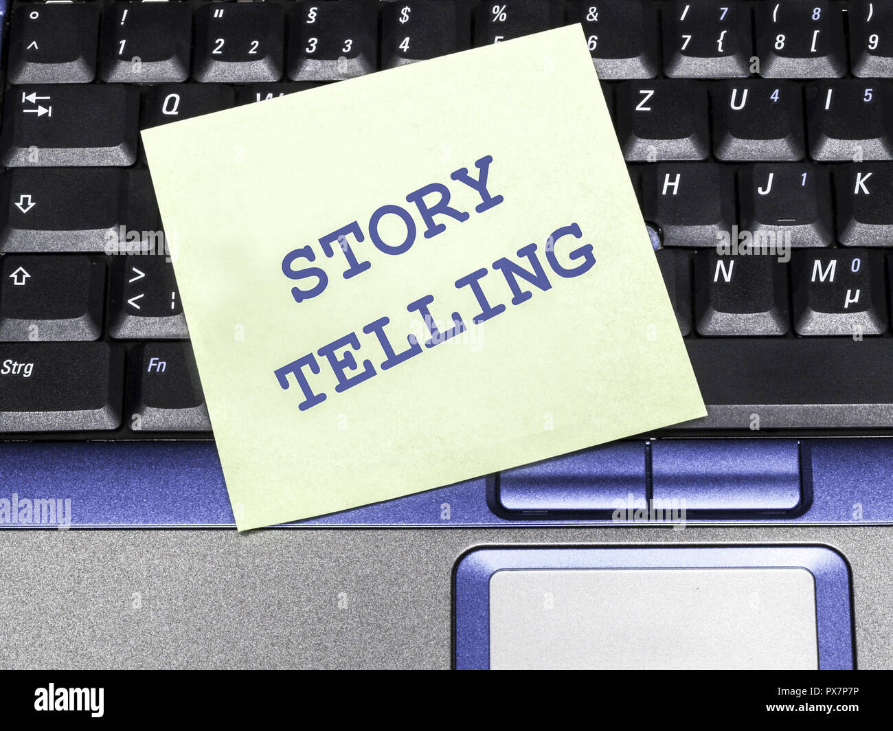 Memo note on notebook, story telling Stock Photo - Alamy