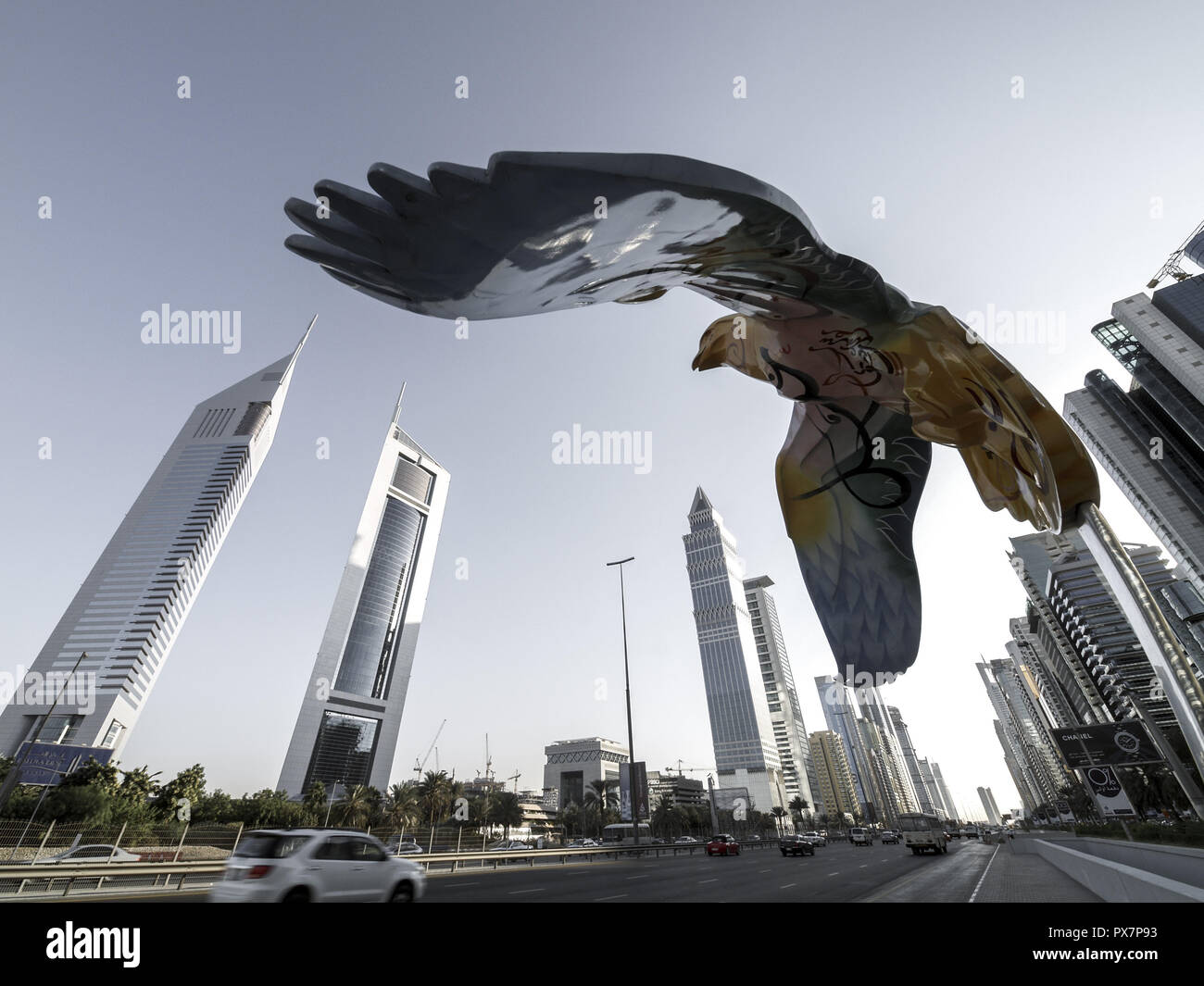 Dubai, Sheik Zayed Road, modern skyline, falcon sculpture, Emirates ...