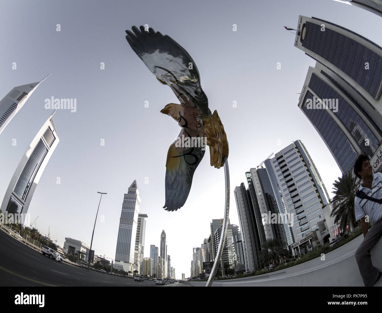 Dubai, Sheik Zayed Road, modern skyline, falcon sculpture, Emirates ...