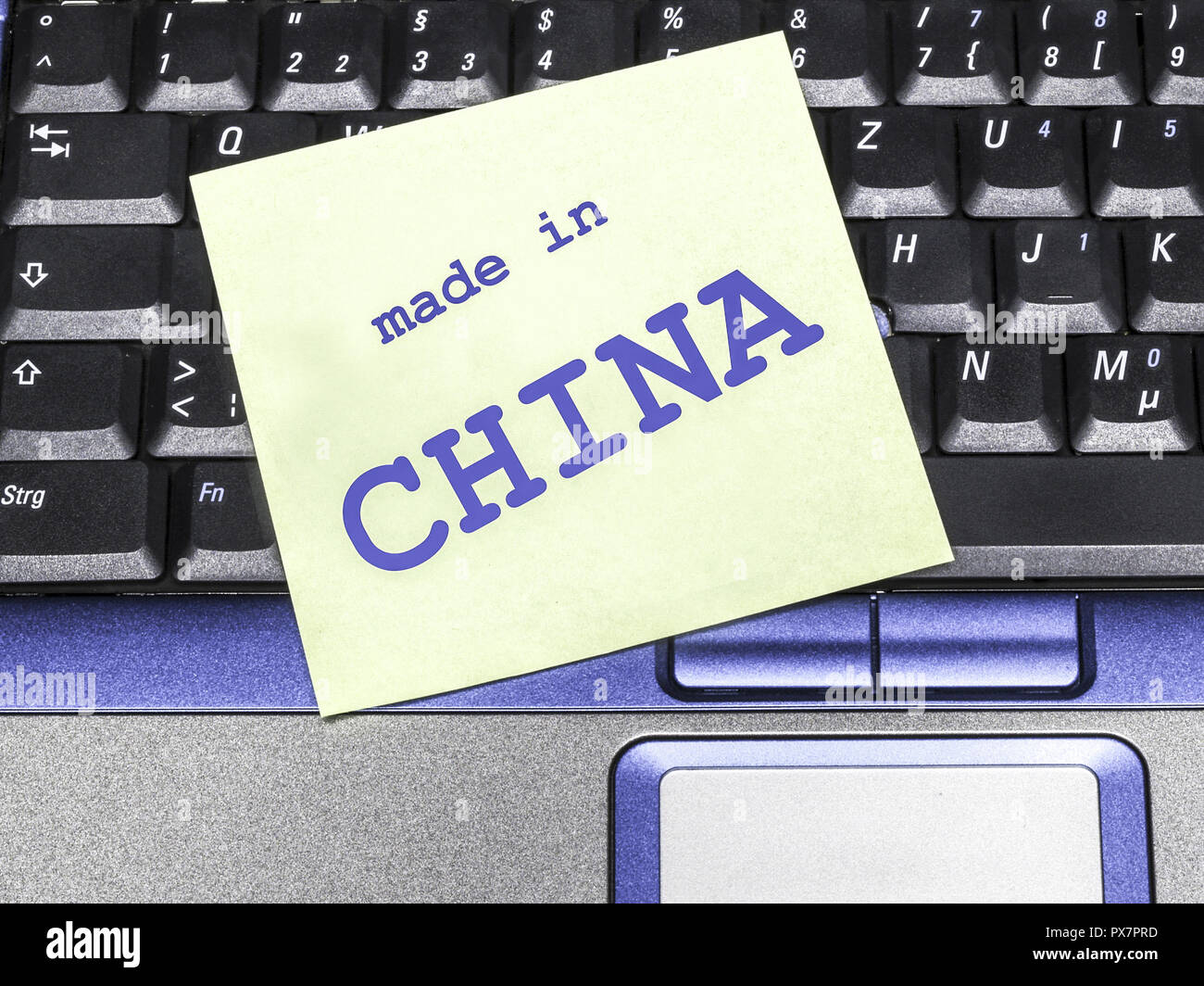 Memo note on notebook, made in China Stock Photo - Alamy