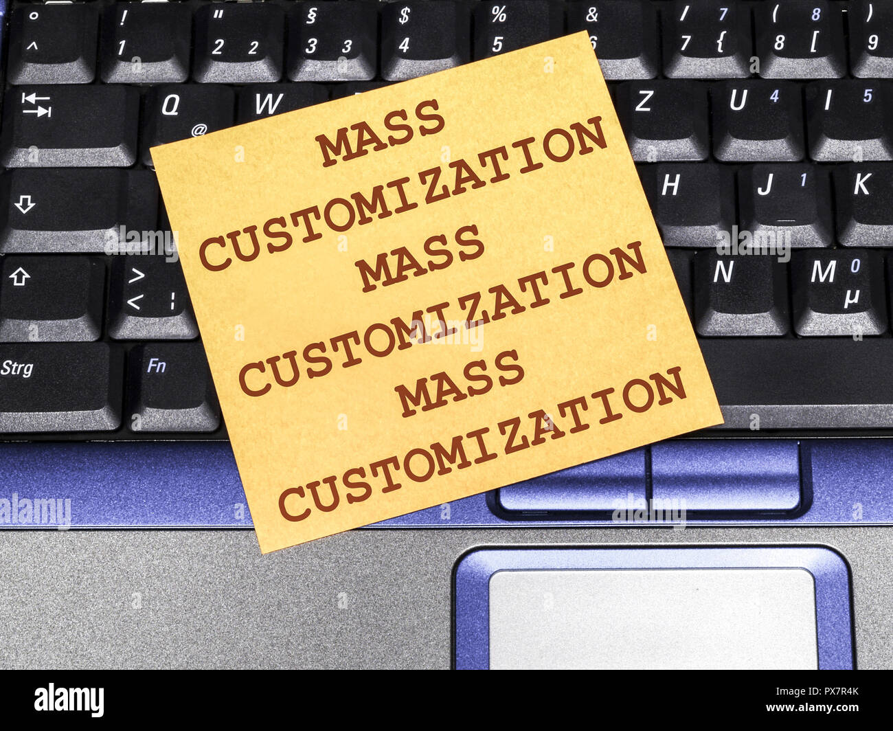Memo note on notebook, mass customization Stock Photo - Alamy