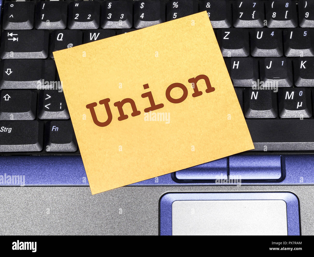 Memo note on notebook, union Stock Photo - Alamy