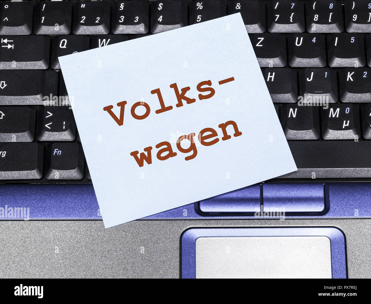 Memo note on notebook, VW, Volkswagen Stock Photo - Alamy