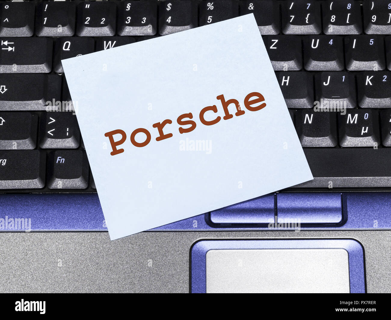 Memo note on notebook, Porsche Stock Photo - Alamy