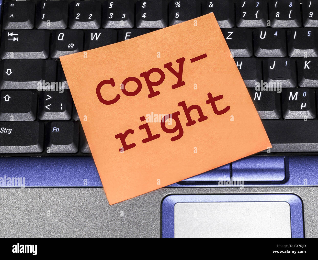 Memo note on notebook, copyright Stock Photo - Alamy