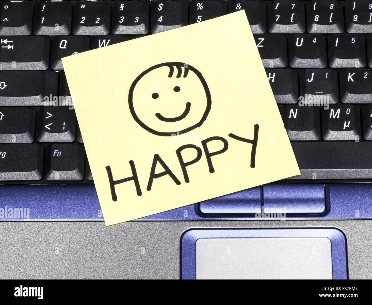 Memo note on notebook, smiley happy drawing Stock Photo - Alamy