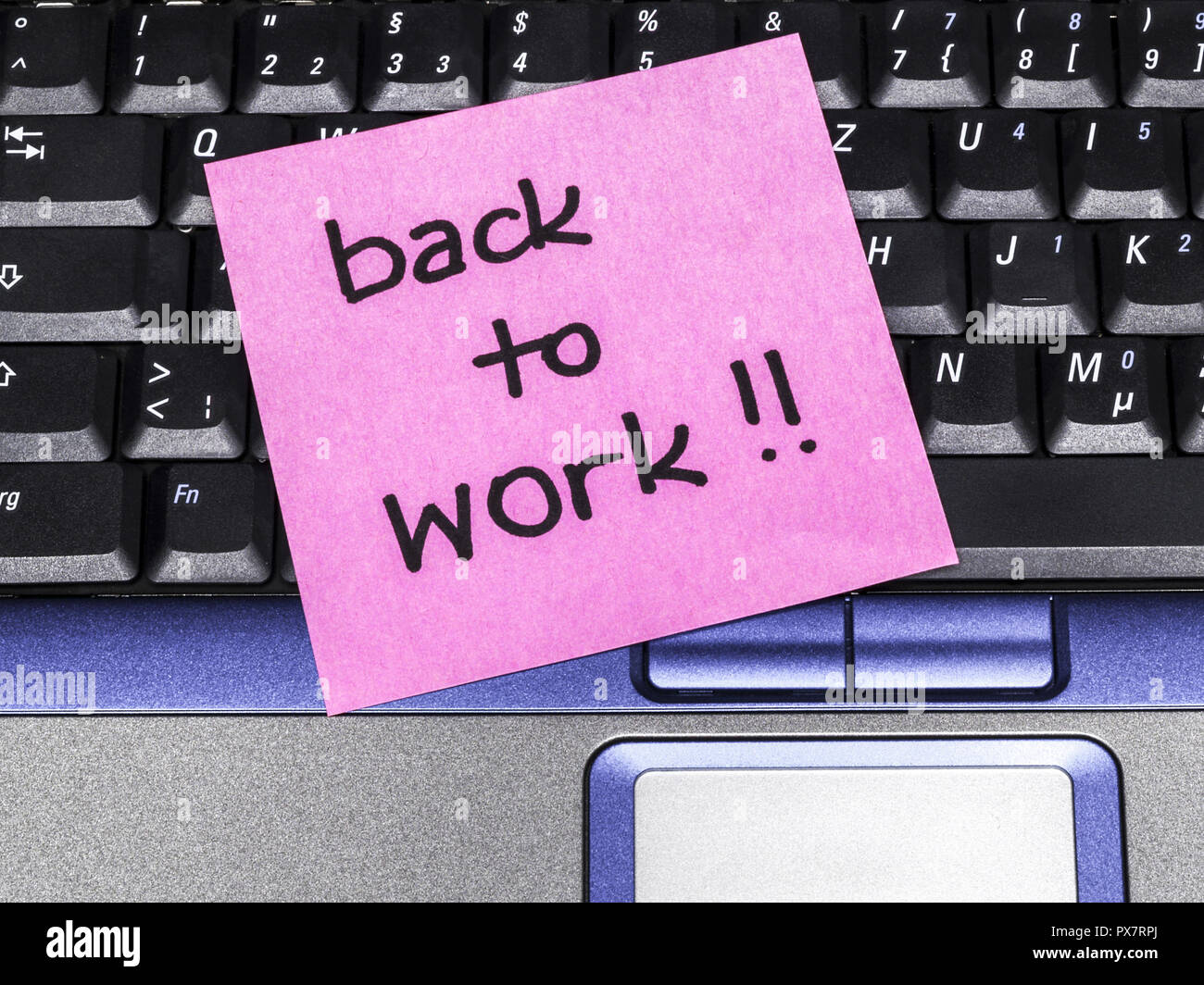 Memo note on notebook, back to work Stock Photo - Alamy