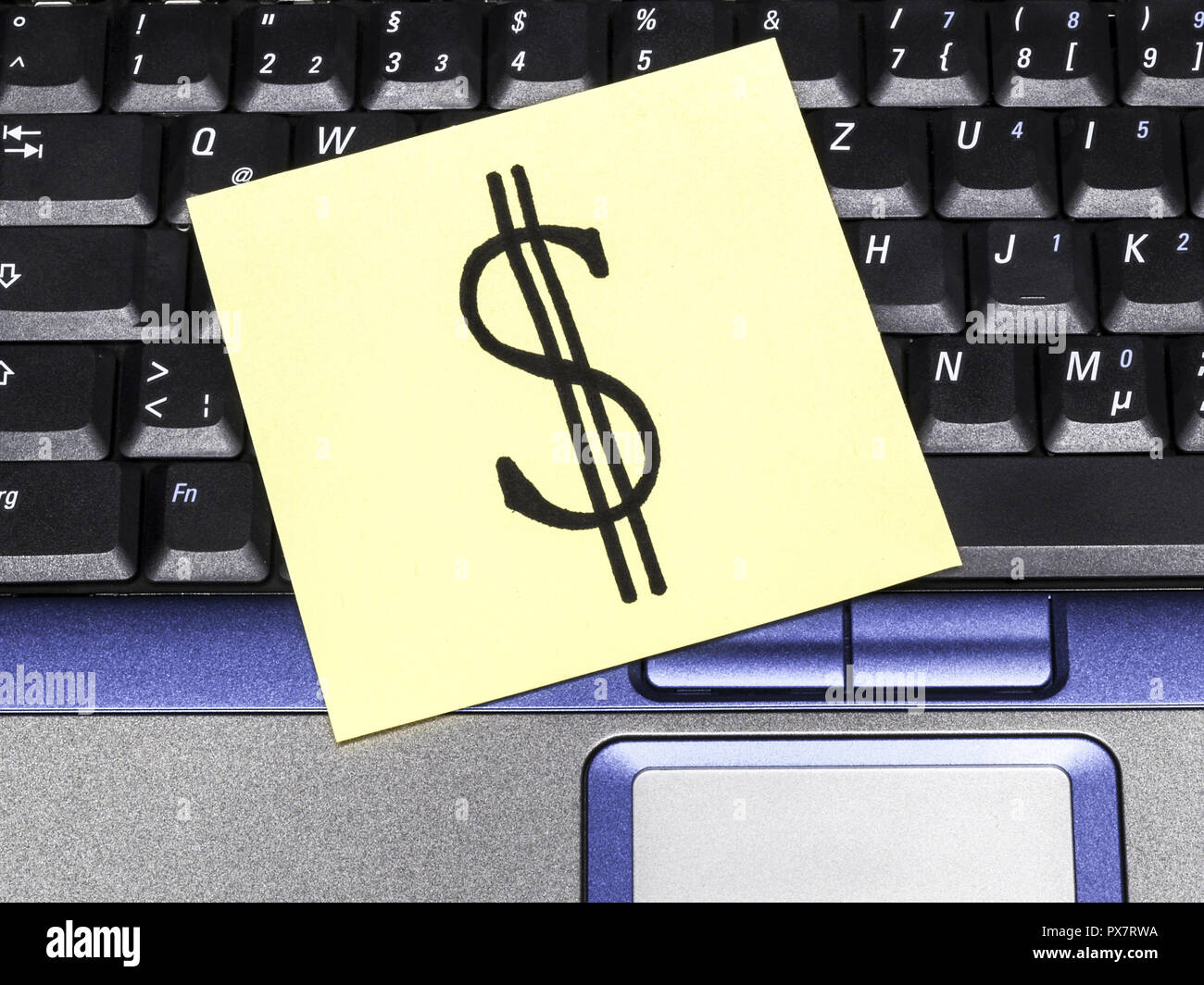 Memo note on notebook, dollar symbol drawing Stock Photo - Alamy