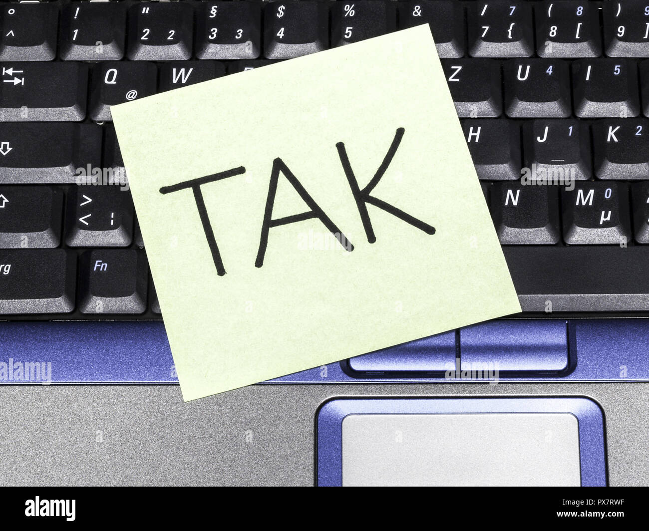 Memo note on notebook, tak Danish thanks Stock Photo - Alamy