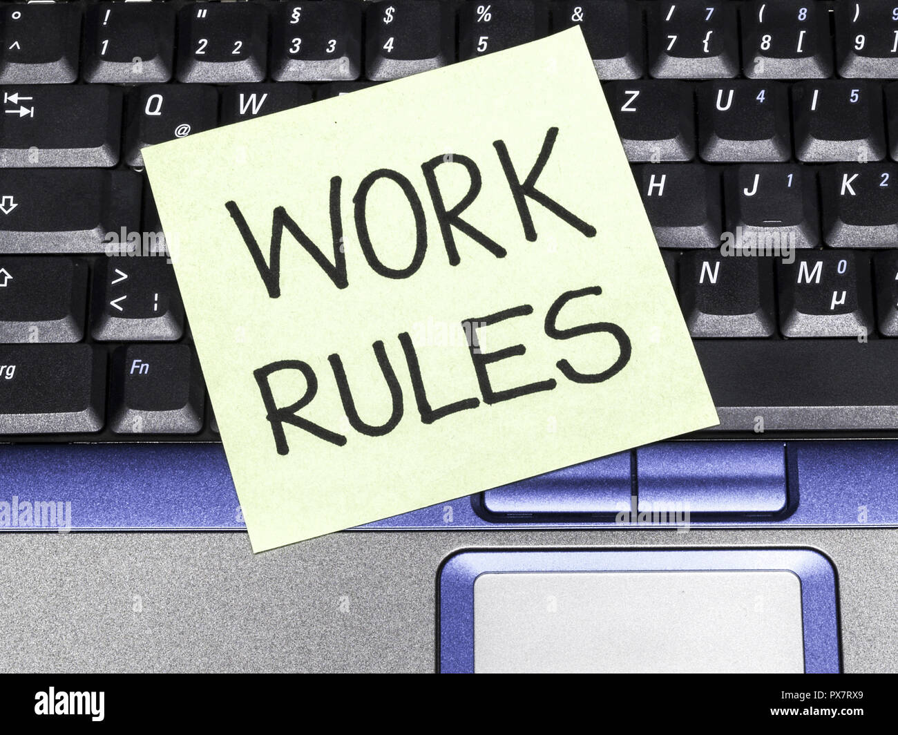 Memo note on notebook, work rules Stock Photo - Alamy