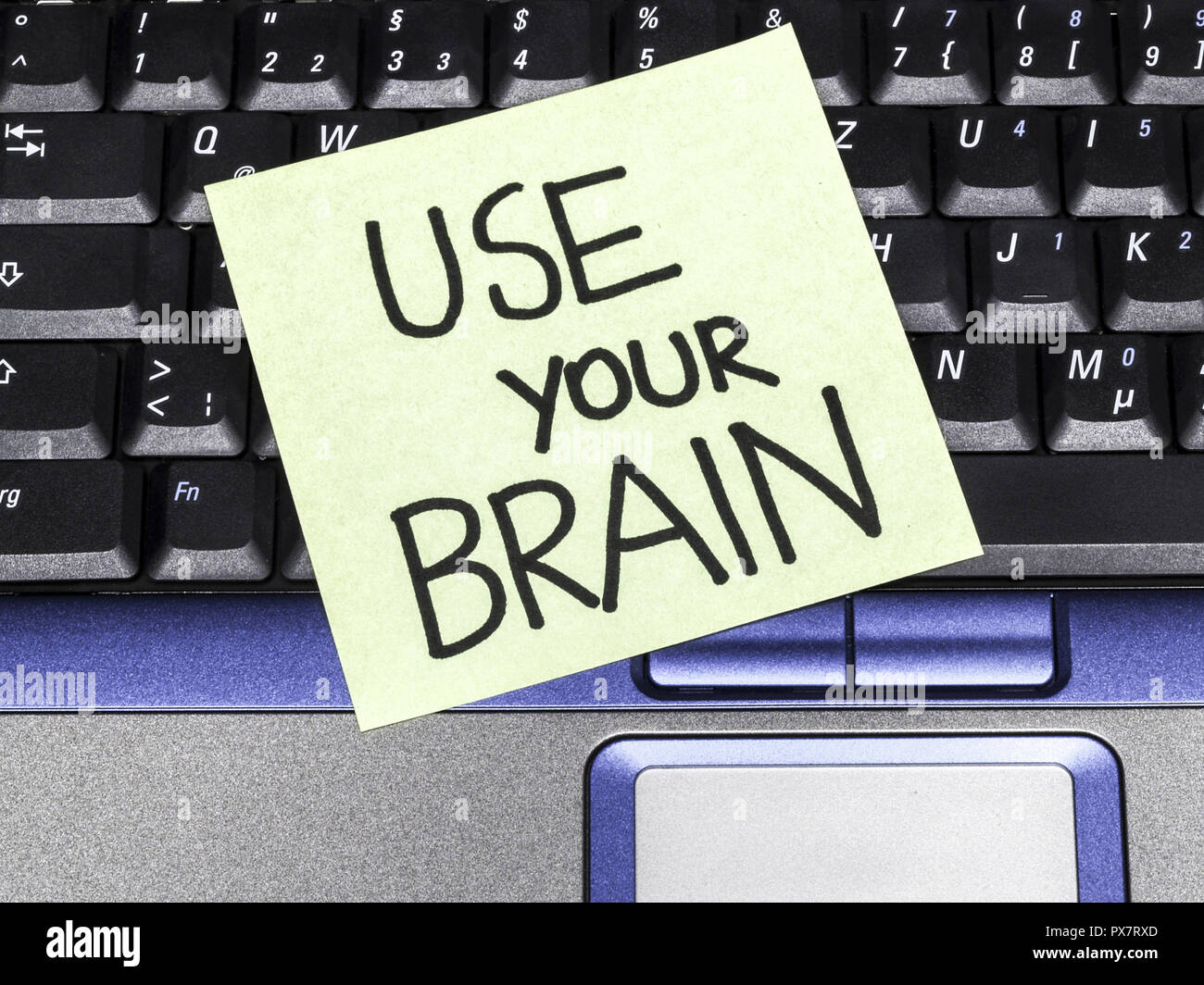 Memo note on notebook, use your brain Stock Photo - Alamy