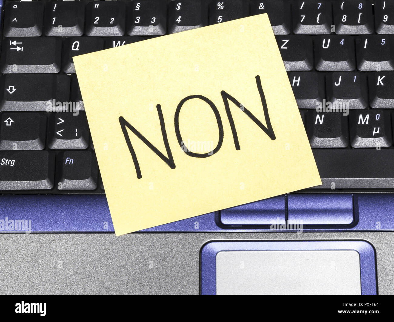 Memo note on notebook, Non, no Stock Photo - Alamy