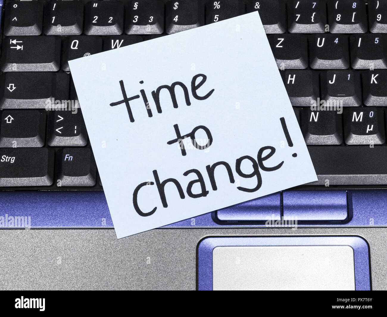 Memo note on notebook, time to change Stock Photo - Alamy