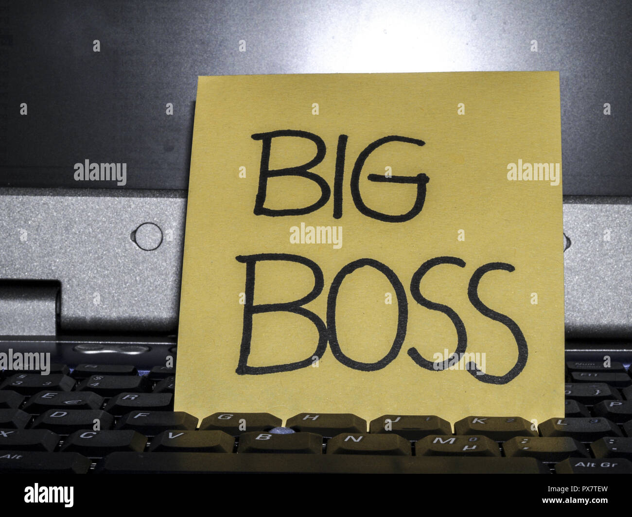 Memo note on notebook, Big Boss Stock Photo - Alamy