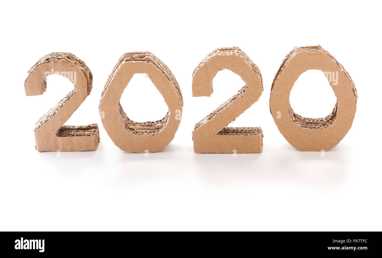 2020, handmade 3D numbers made of reused cardboard paper, on white ...