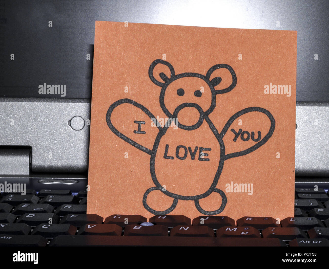 Memo note on notebook, I love you drawing Stock Photo - Alamy