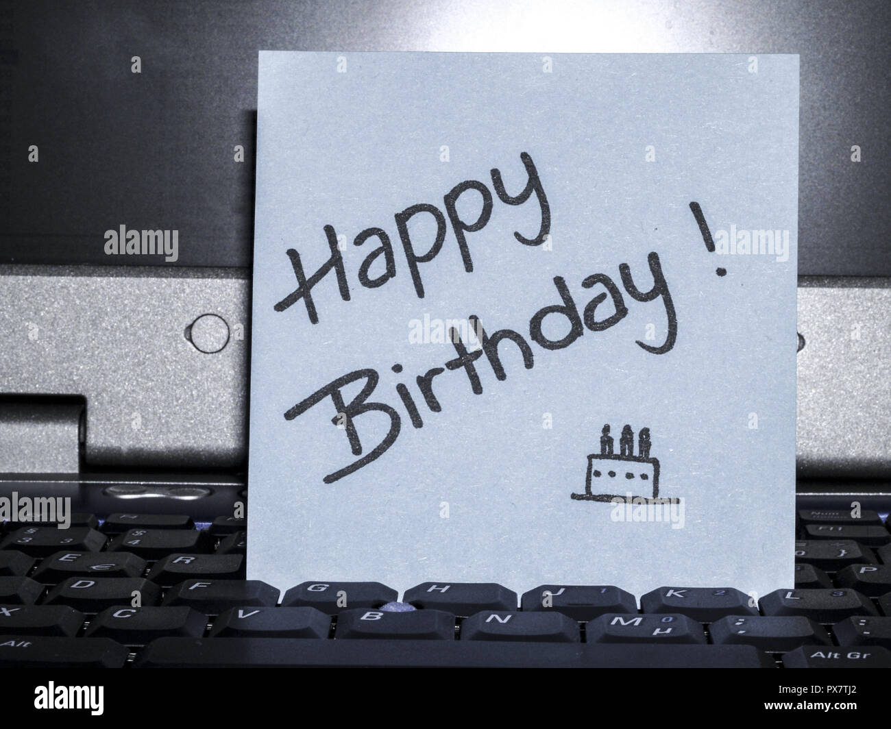 Memo note on notebook, Happy Birthday Stock Photo - Alamy