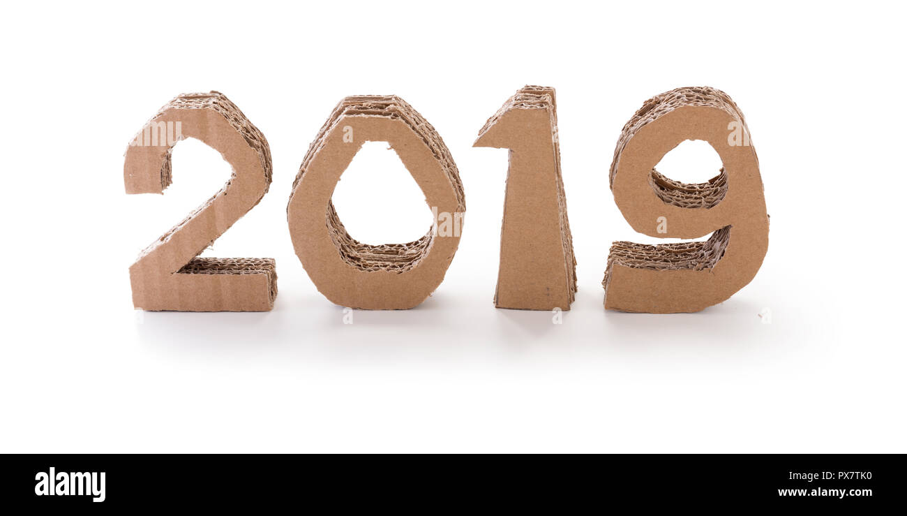 2019, handmade 3D numbers made of reused cardboard paper, on white ...
