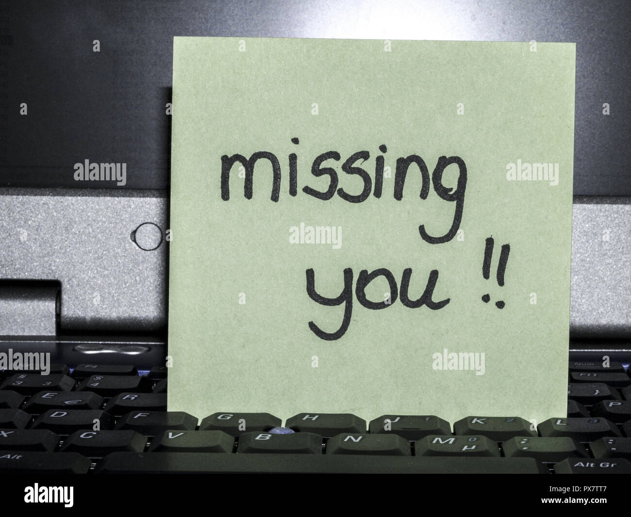 Memo note on notebook, missing you Stock Photo - Alamy