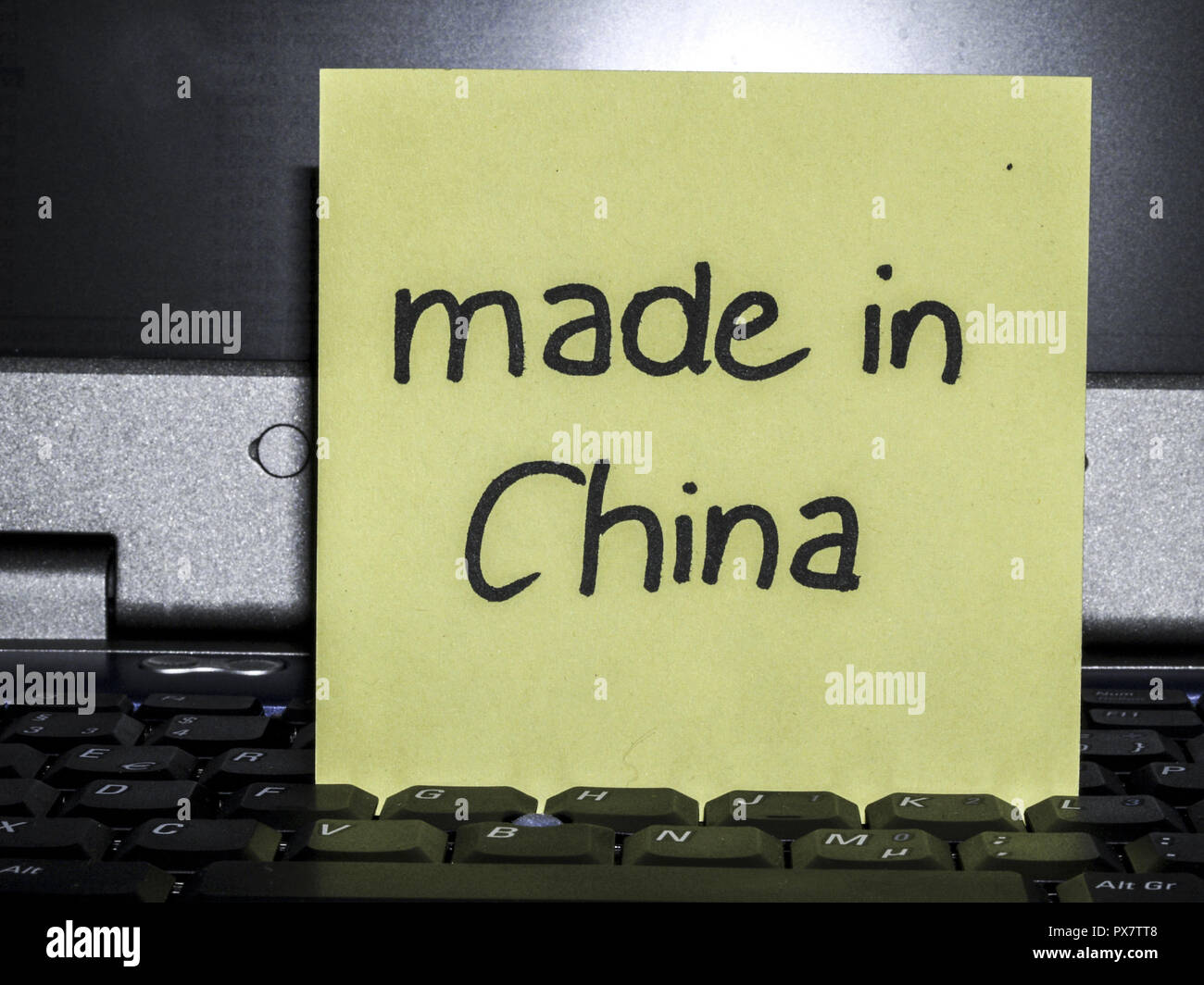 Memo note on notebook, made in China Stock Photo - Alamy