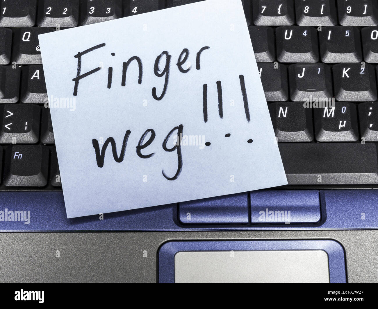 Memo note on notebook, hands off Stock Photo - Alamy