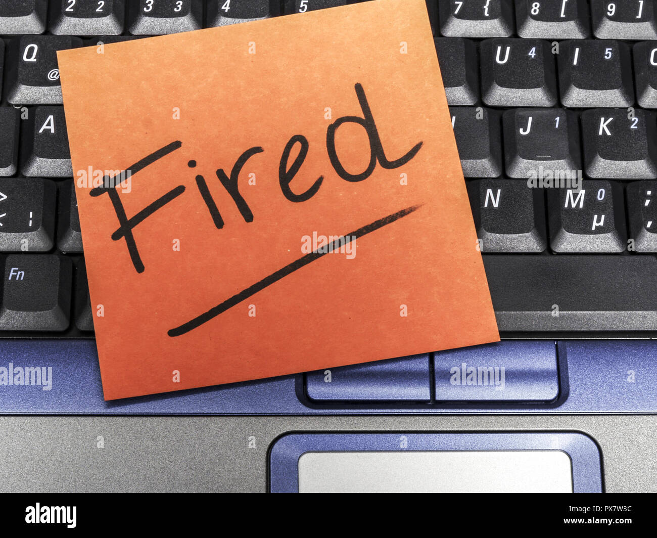 Memo note on notebook, fired Stock Photo - Alamy
