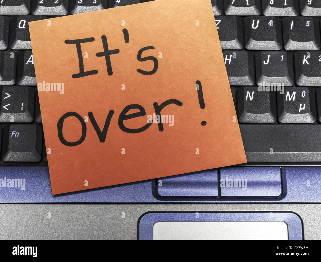 Memo note on notebook, it´s over Stock Photo - Alamy