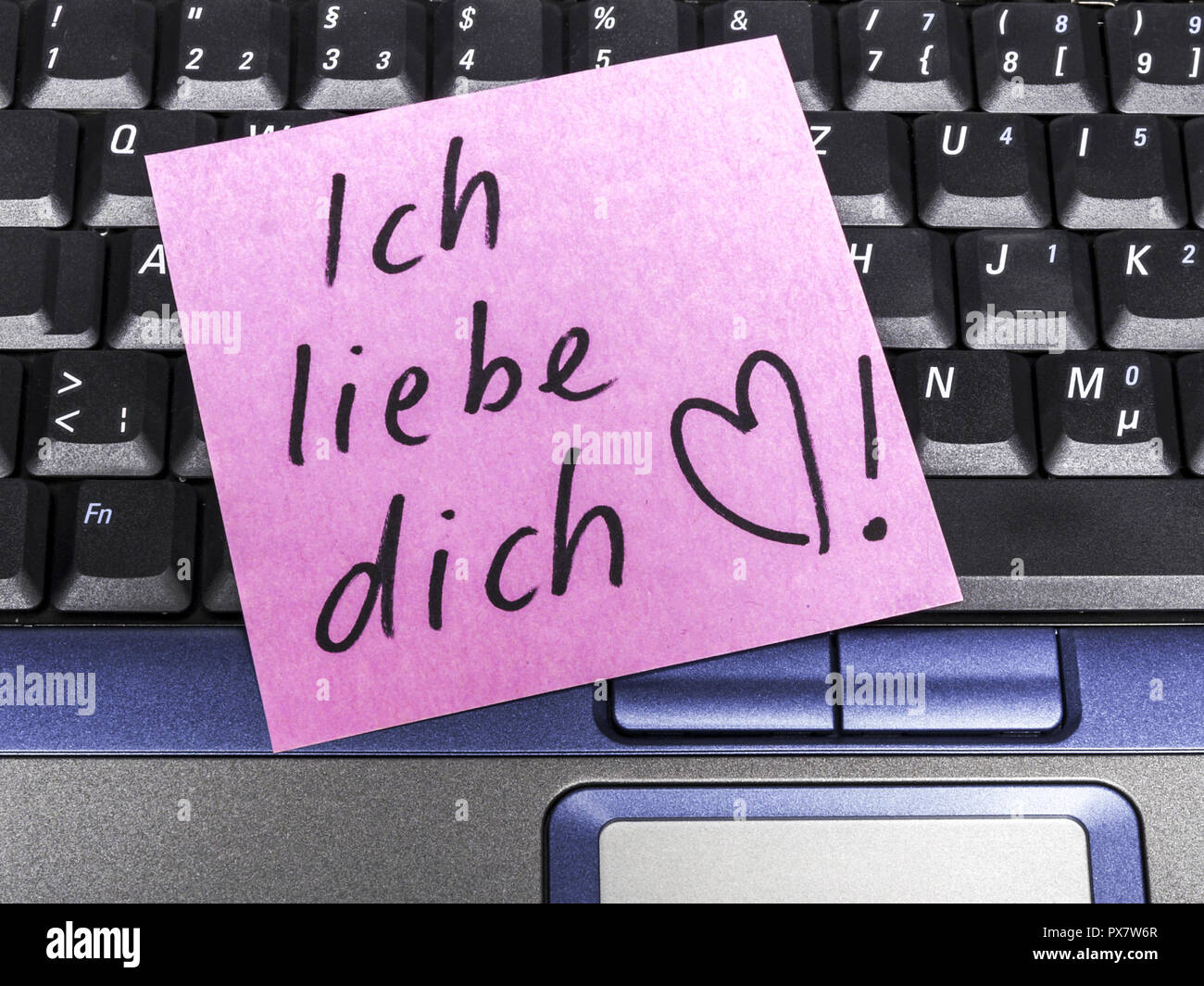 Memo note on notebook, ich liebe dich, I love you Stock Photo - Alamy