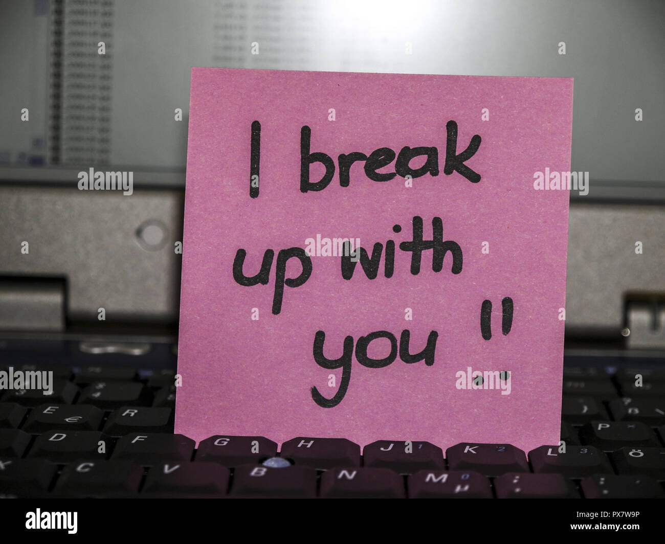 Memo note on notebook, I break up with you Stock Photo - Alamy