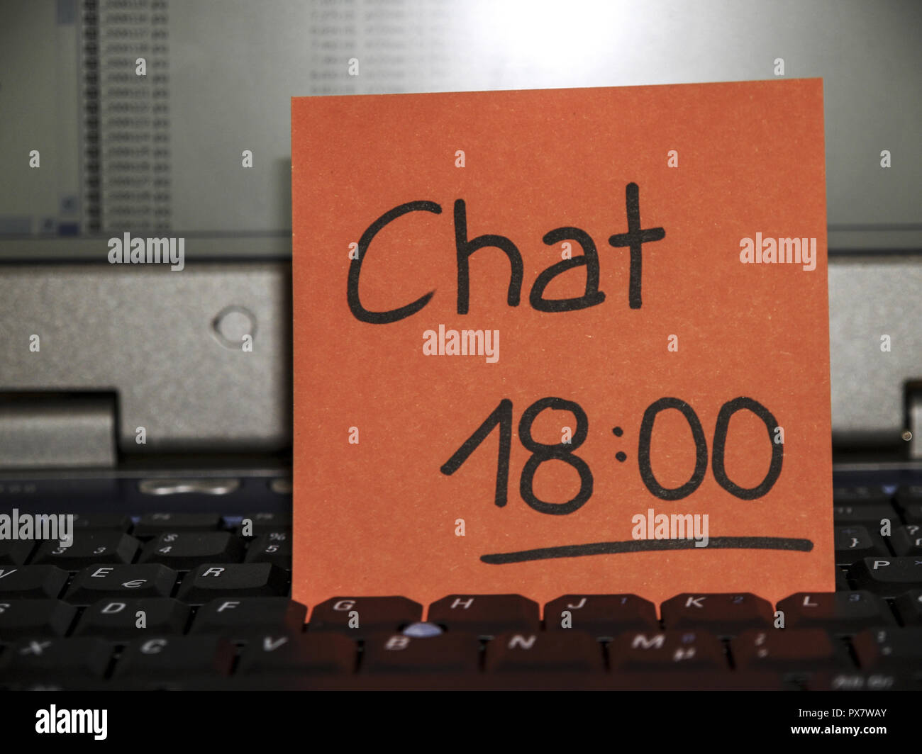 Memo note on notebook, Chat six p.m., chat apointment Stock Photo - Alamy