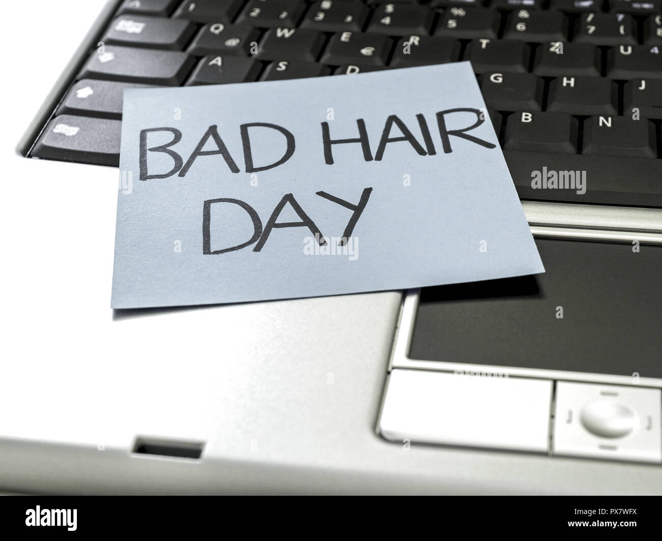 Memo note on notebook, bad hair day Stock Photo - Alamy
