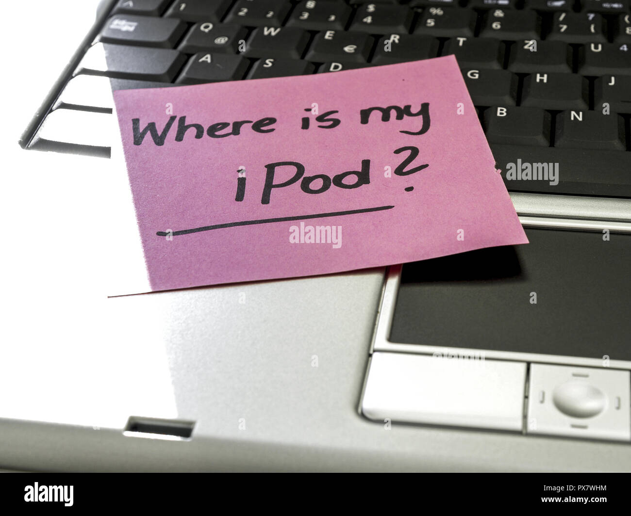 Memo note on notebook, where is my iPod Stock Photo - Alamy