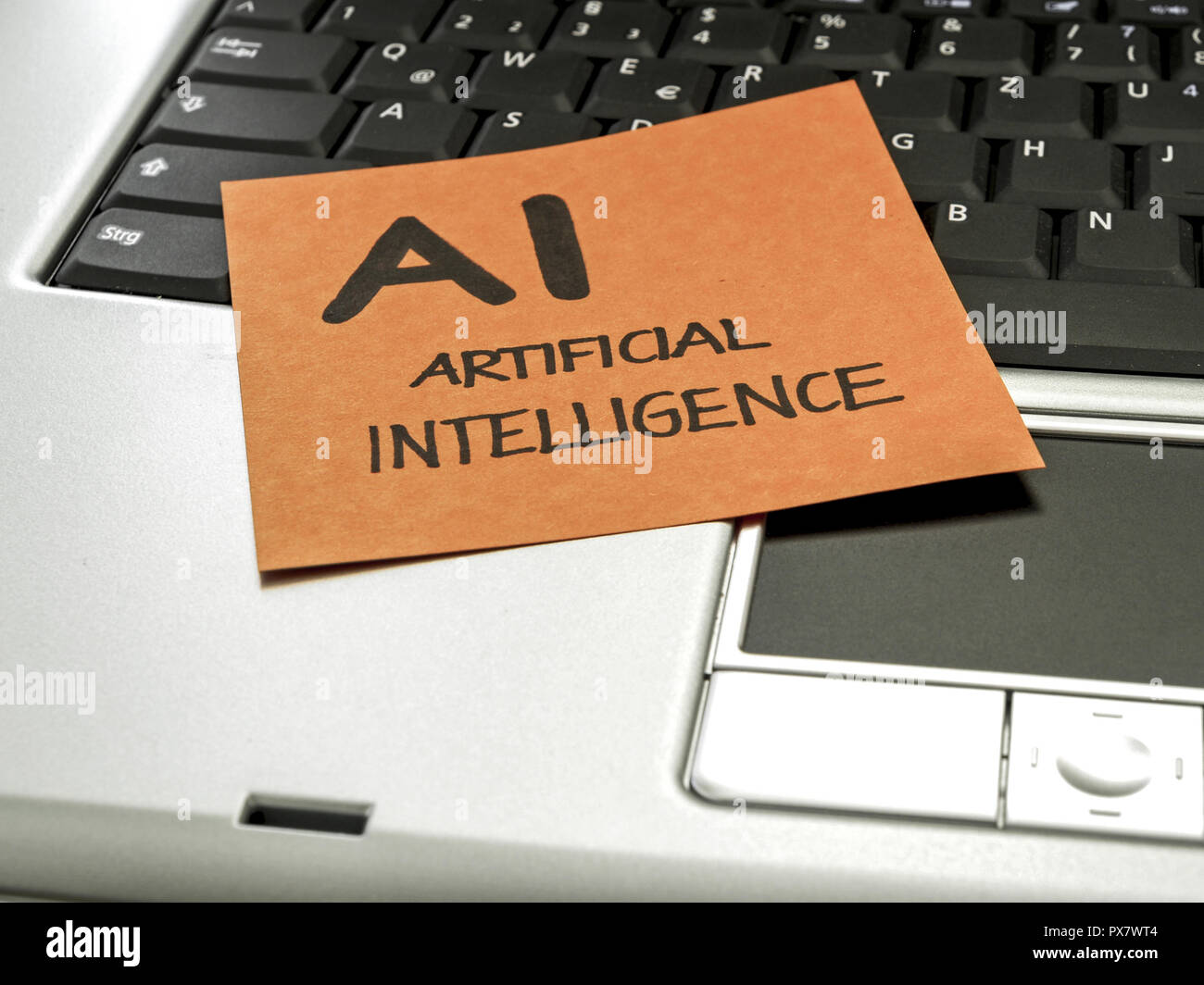 Memo note on notebook, AI, artificial intelligence Stock Photo - Alamy