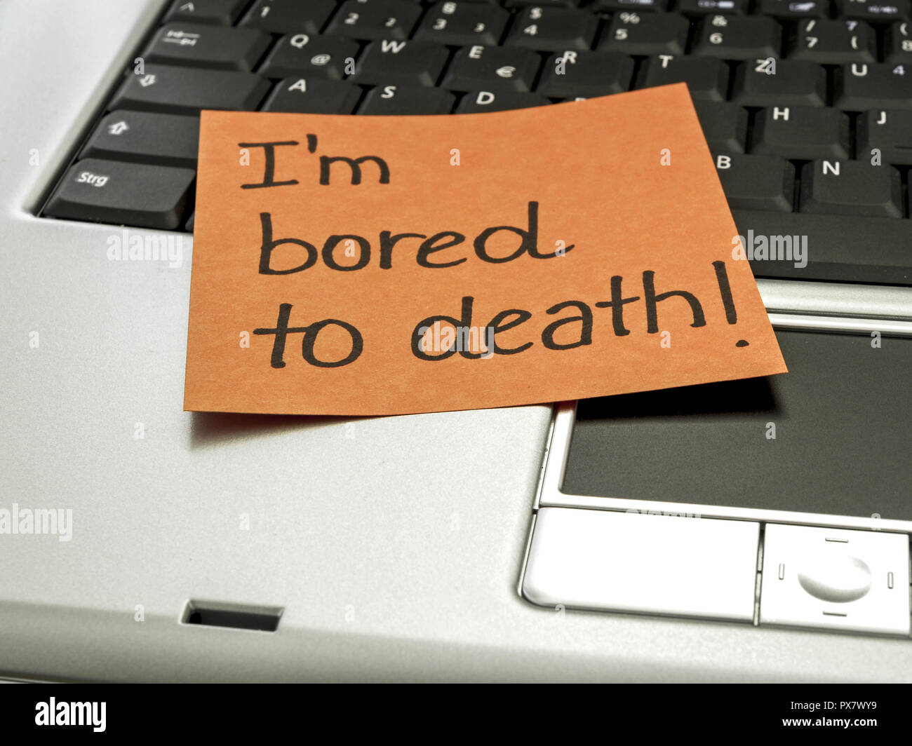 Memo note on notebook, I´m bored to death Stock Photo - Alamy