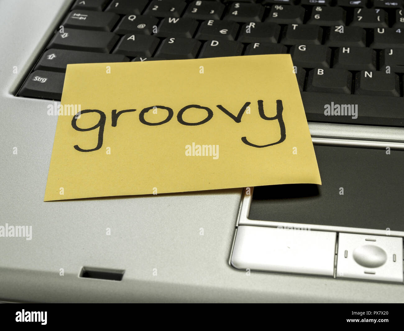 Memo note on notebook, groovy Stock Photo - Alamy
