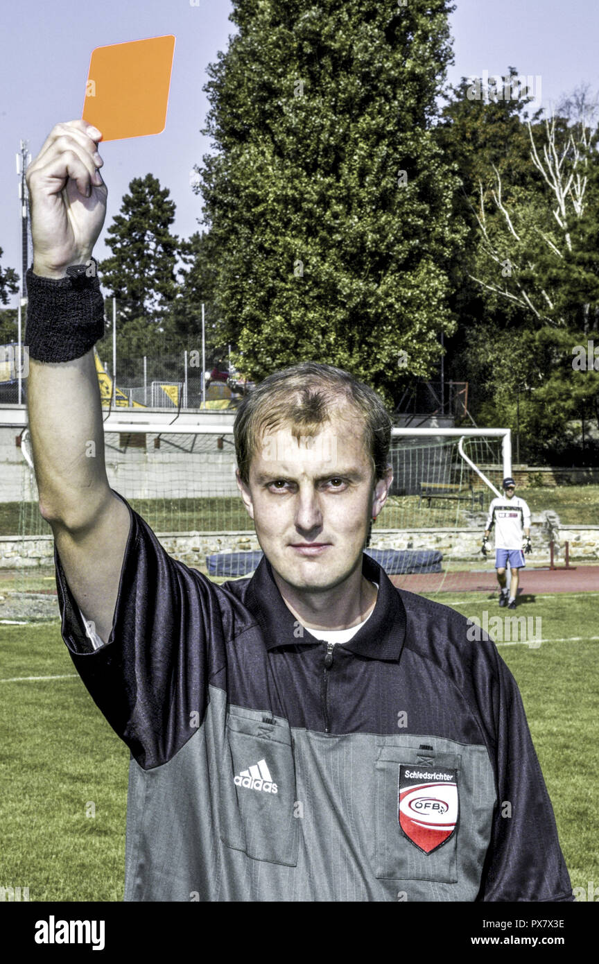 Referee with red card (model-released Stock Photo - Alamy
