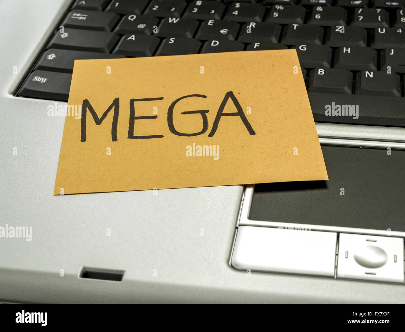 Memo note on notebook, mega Stock Photo - Alamy