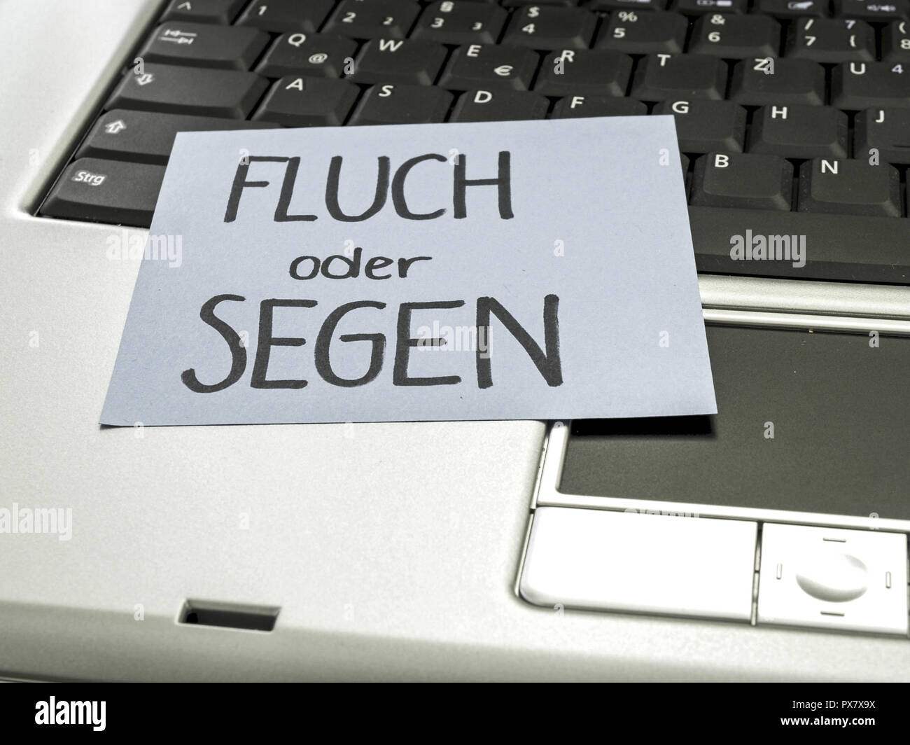 Memo note on notebook, boon or bane Stock Photo - Alamy