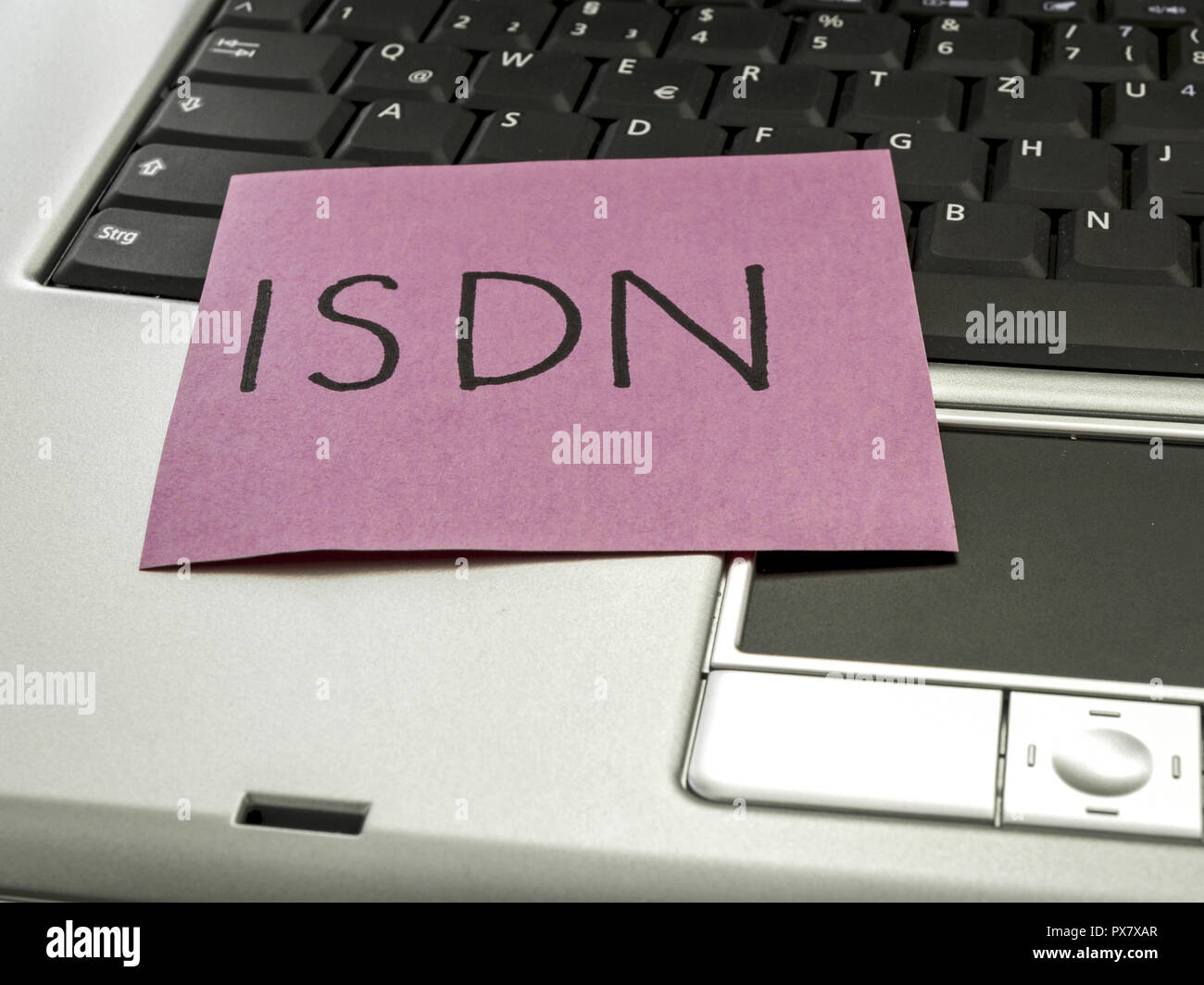 Memo note on notebook, ISDN Stock Photo - Alamy
