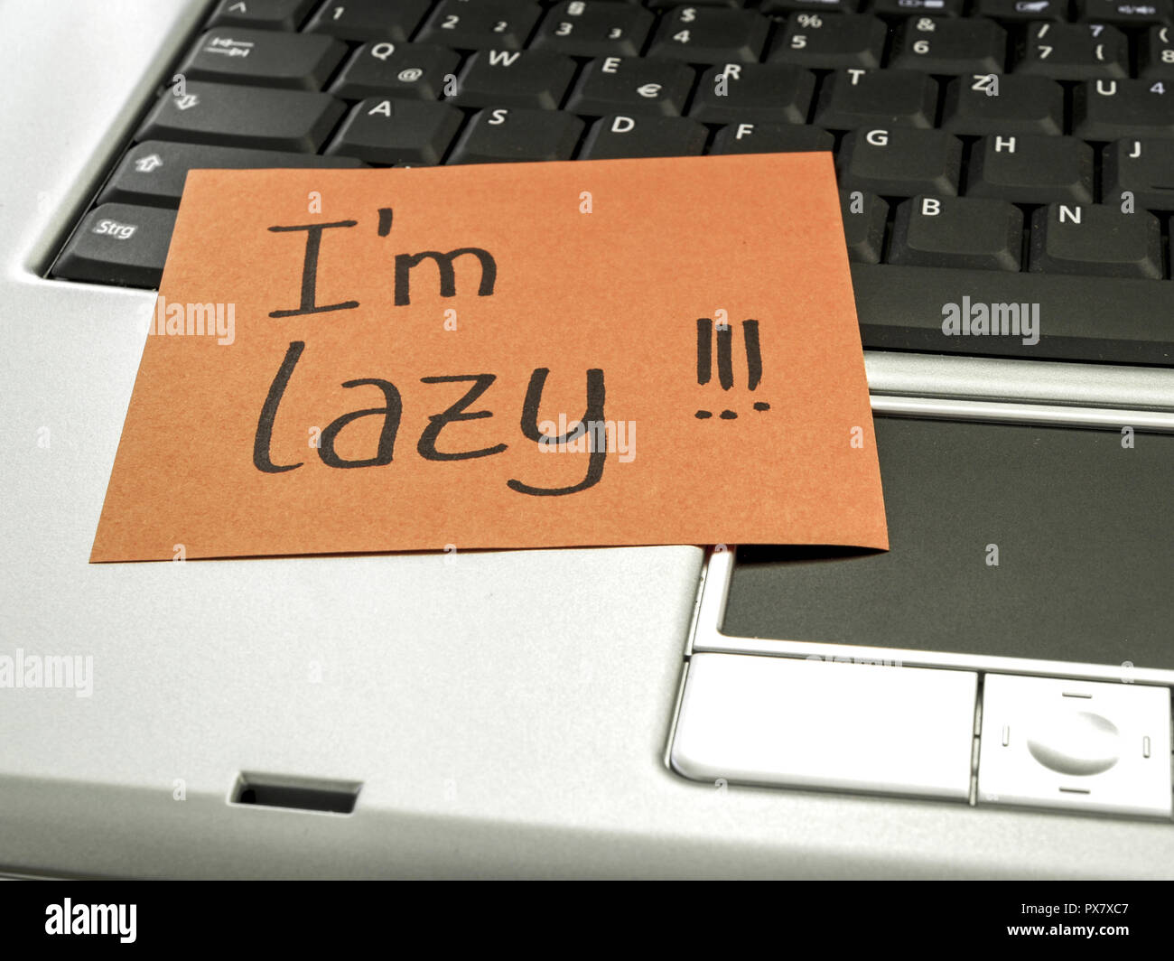 Memo note on notebook, I´m lazy Stock Photo - Alamy