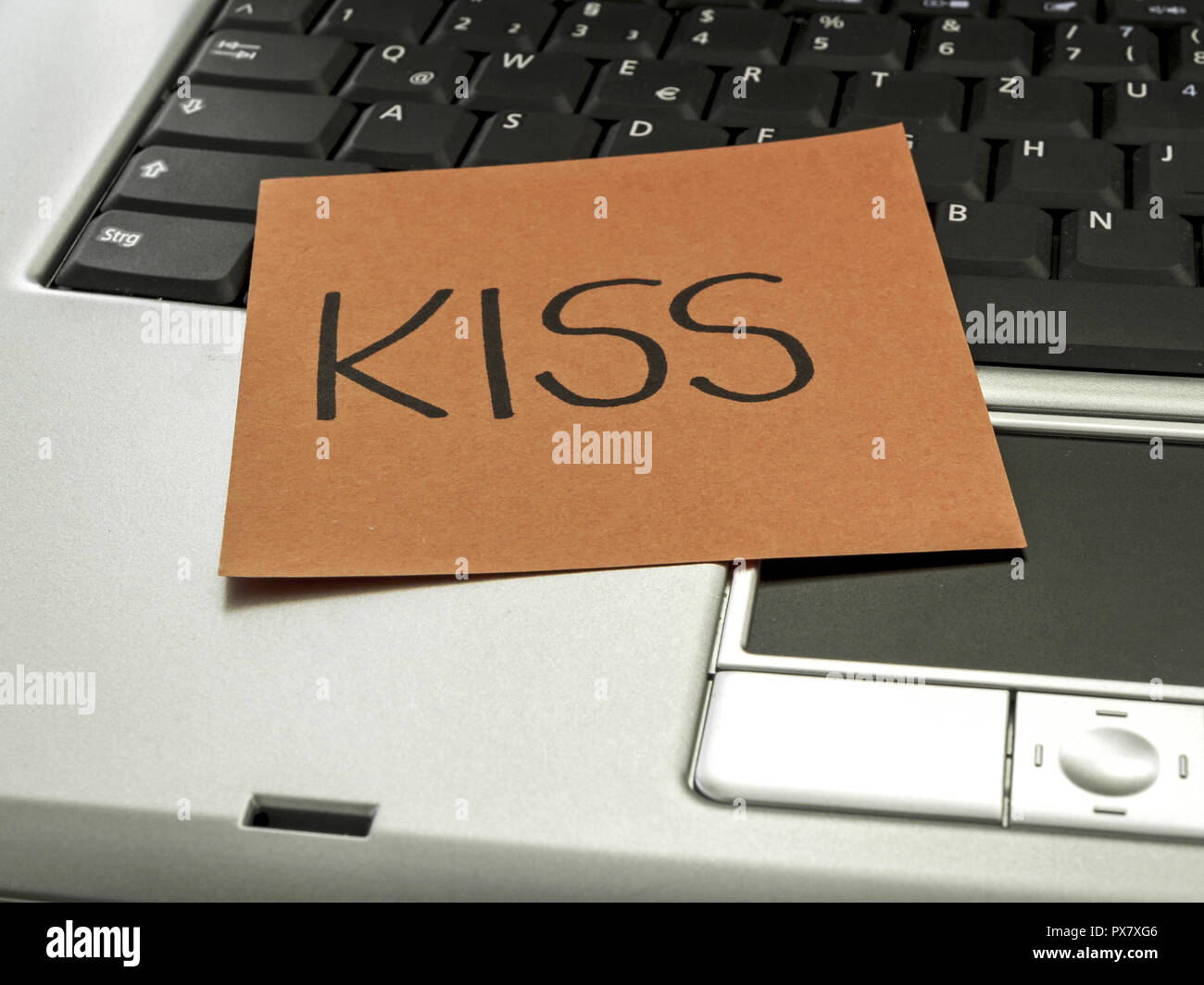 Memo note on notebook, kiss Stock Photo - Alamy