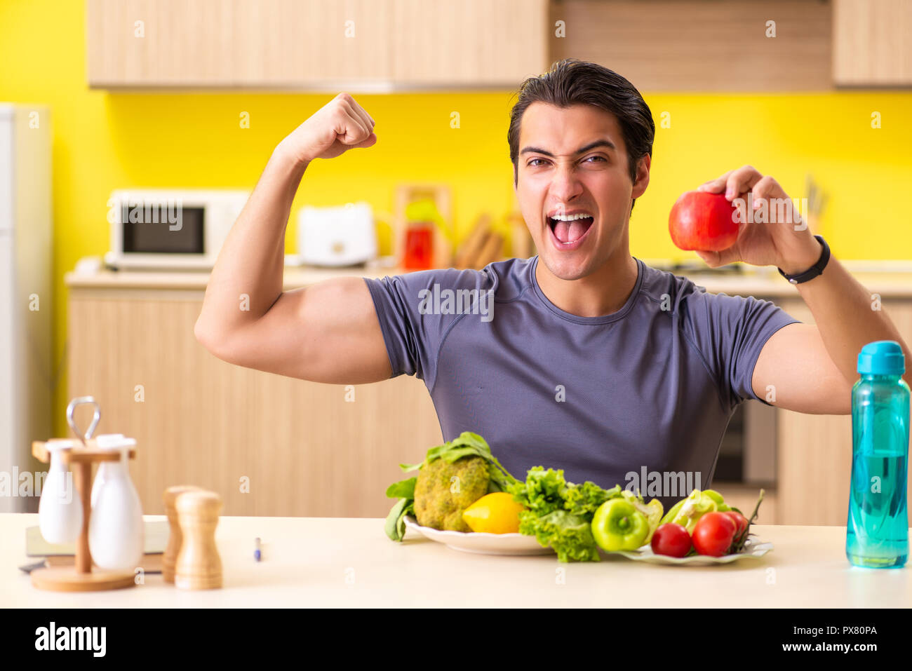 Young man in dieting and healthy eating concept Stock Photo - Alamy